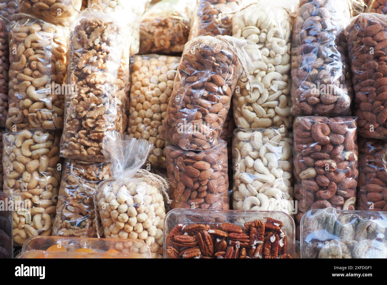 many mixed nuts in a plastic packet on shelf Stock Photo - Alamy