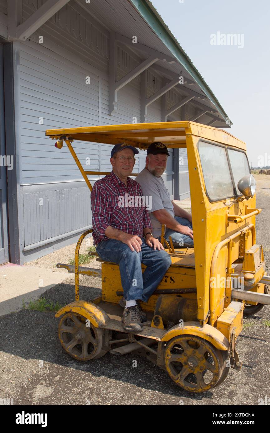 Former Milwaukee Road employees sit in "speeder" like they used while ...