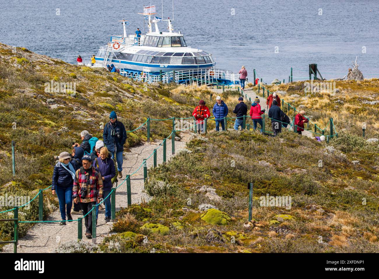 Tourists landing on Bridges Island, in the Beagle Channel, near Ushuaia ...