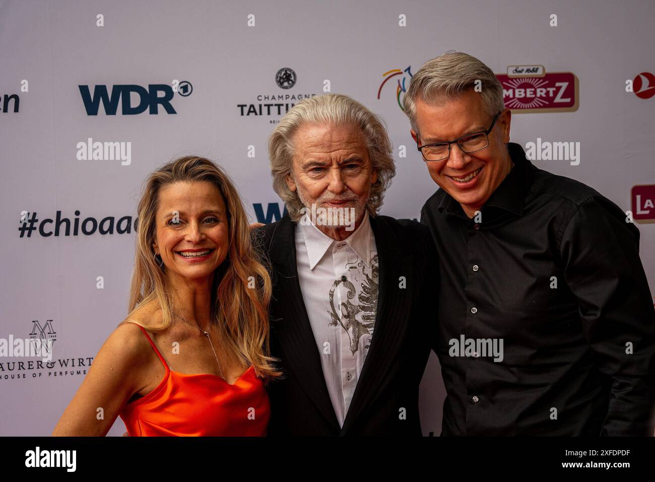 Frank Thelen mit Ehefrau Nathalie und Lambertz Inhaber Hermann ...