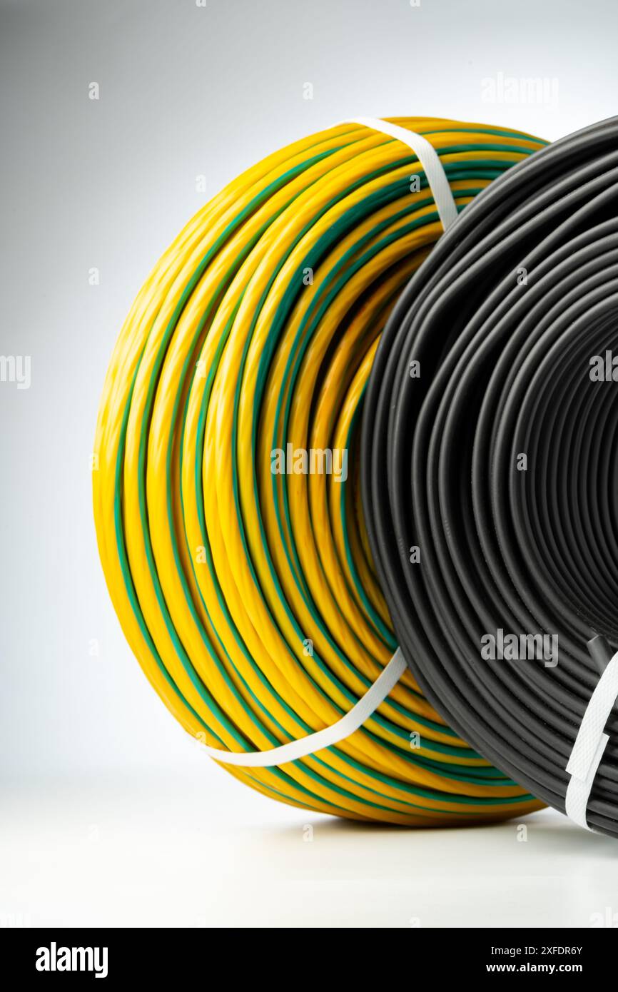 Yellow And Black Electrical Wire Spools Isolated On White Background ...