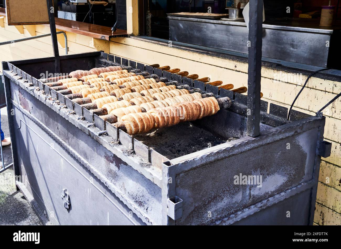Sweet Chimney Cakes Being Baked Over a Charcoal Fire at a Market Stall ...
