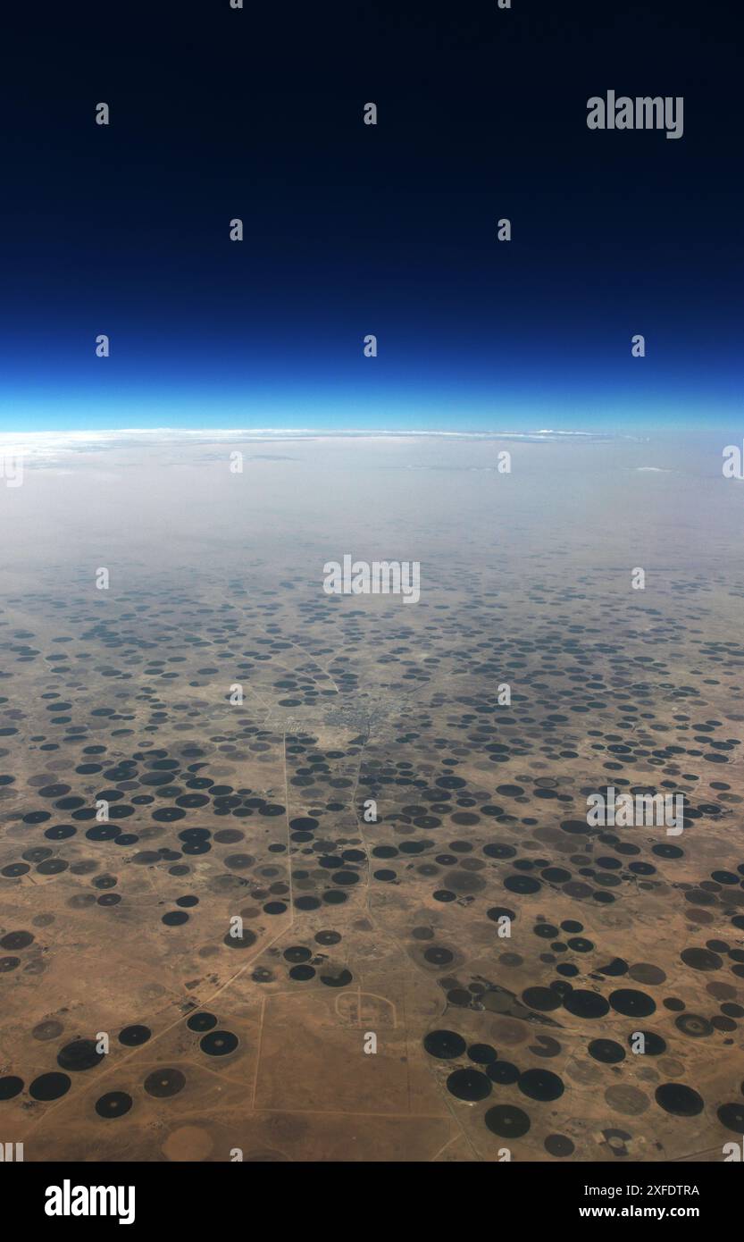 Aerial view of circular agriculture fields in the Arabian desert in ...