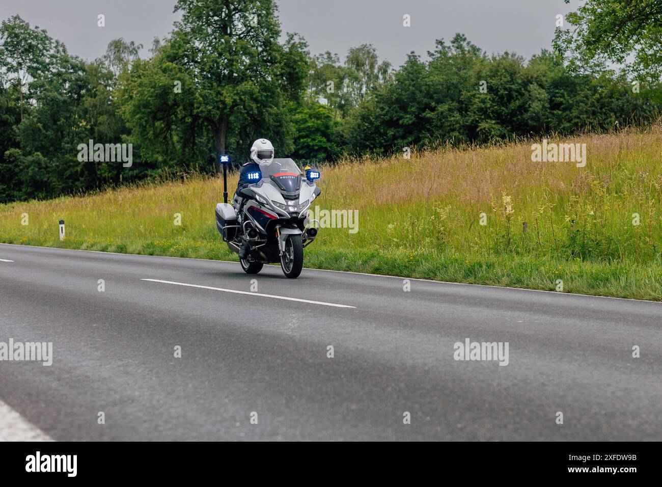 Police officer on motorbike hi-res stock photography and images - Alamy