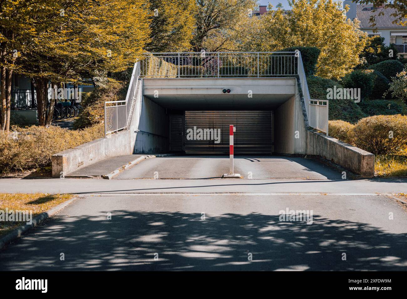 Entrance to the residential garage with electric door. Garage for ...
