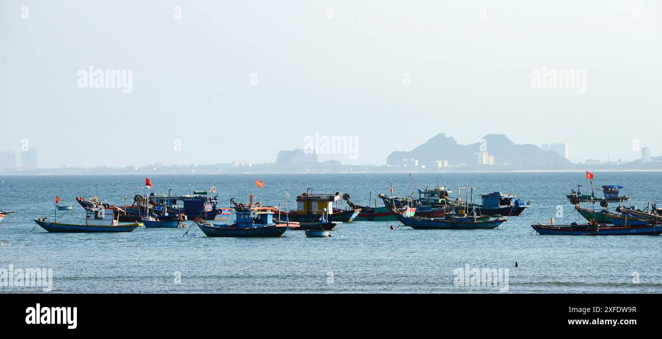 Fishing boats by the Man Thai beach in Da Nang, Vietnam Stock Photo - Alamy