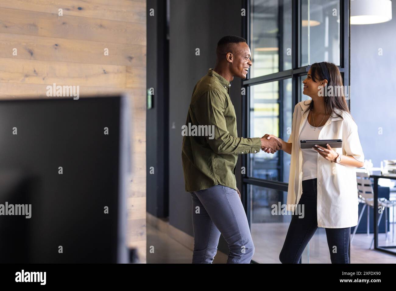 Business professionals shaking hands digital hi-res stock photography ...