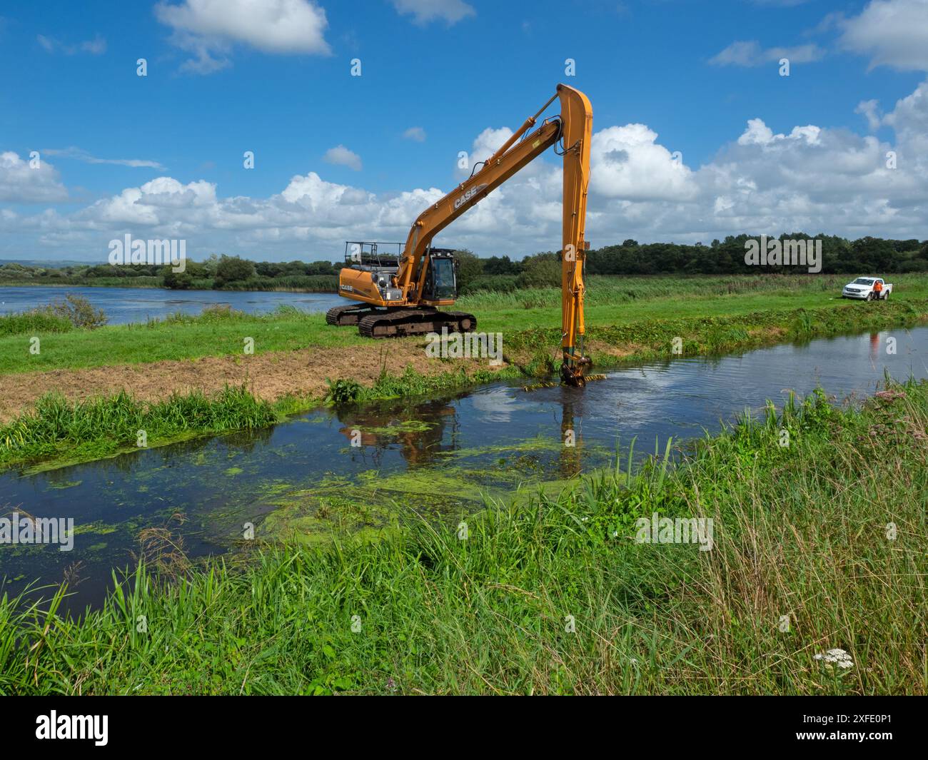 Machinery clearing vegetation out of South Drain, Shapwick Heath ...