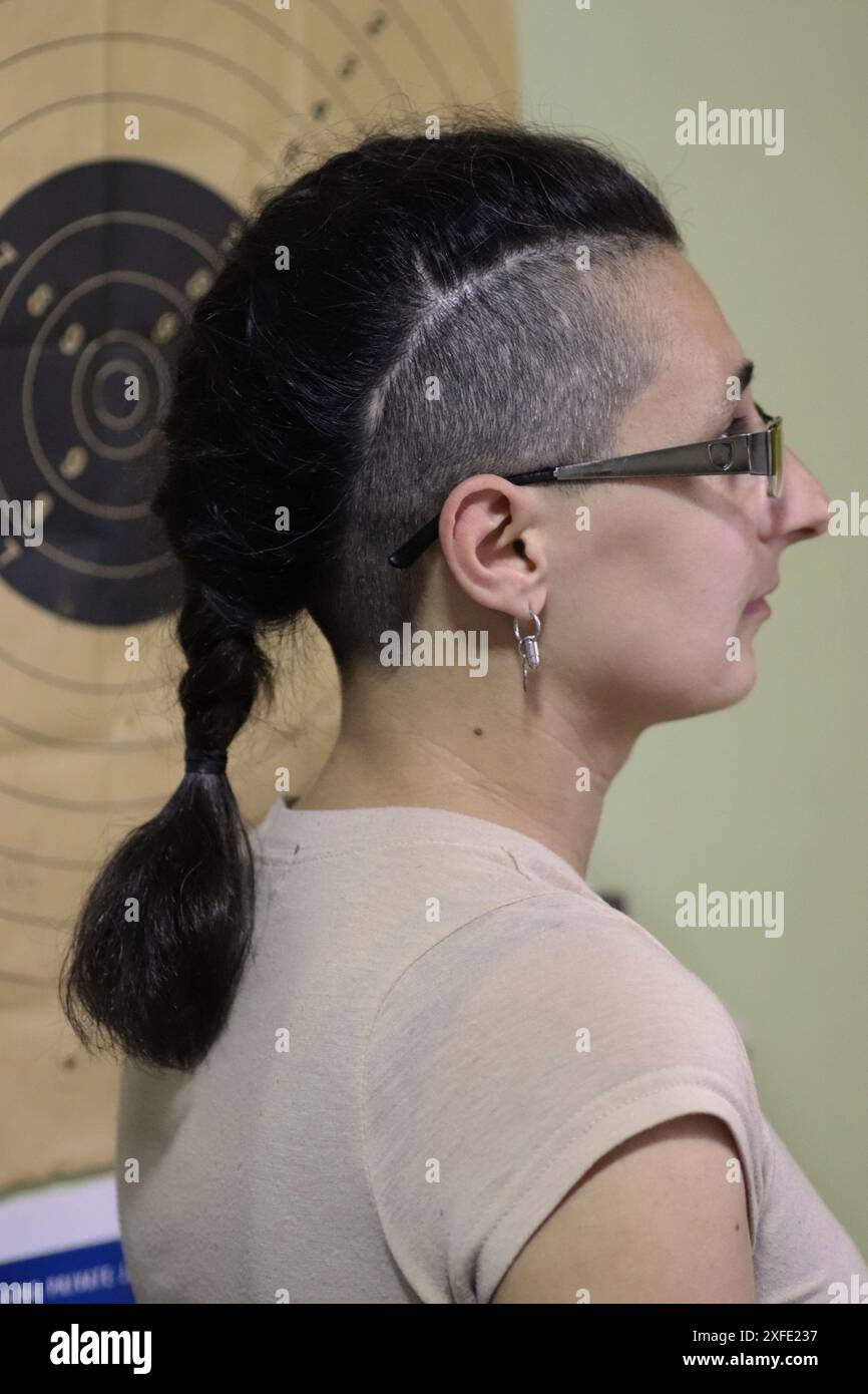 Portrait Of A Girl In Glasses With Shaved Temples And A Braid Dark