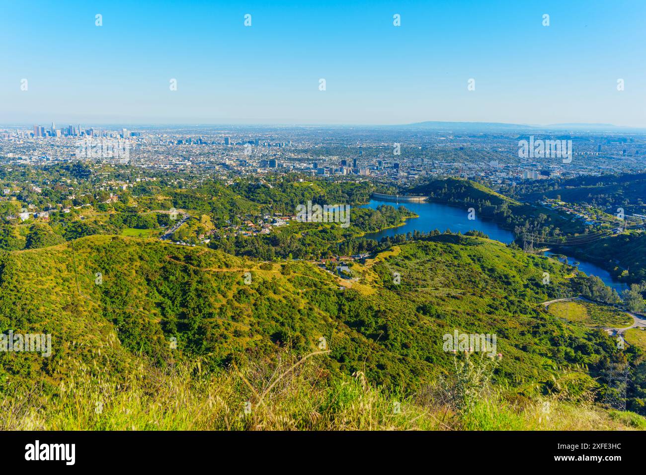 Sprawling Los Angeles cityscape and reservoir seen from Mount Lee ...