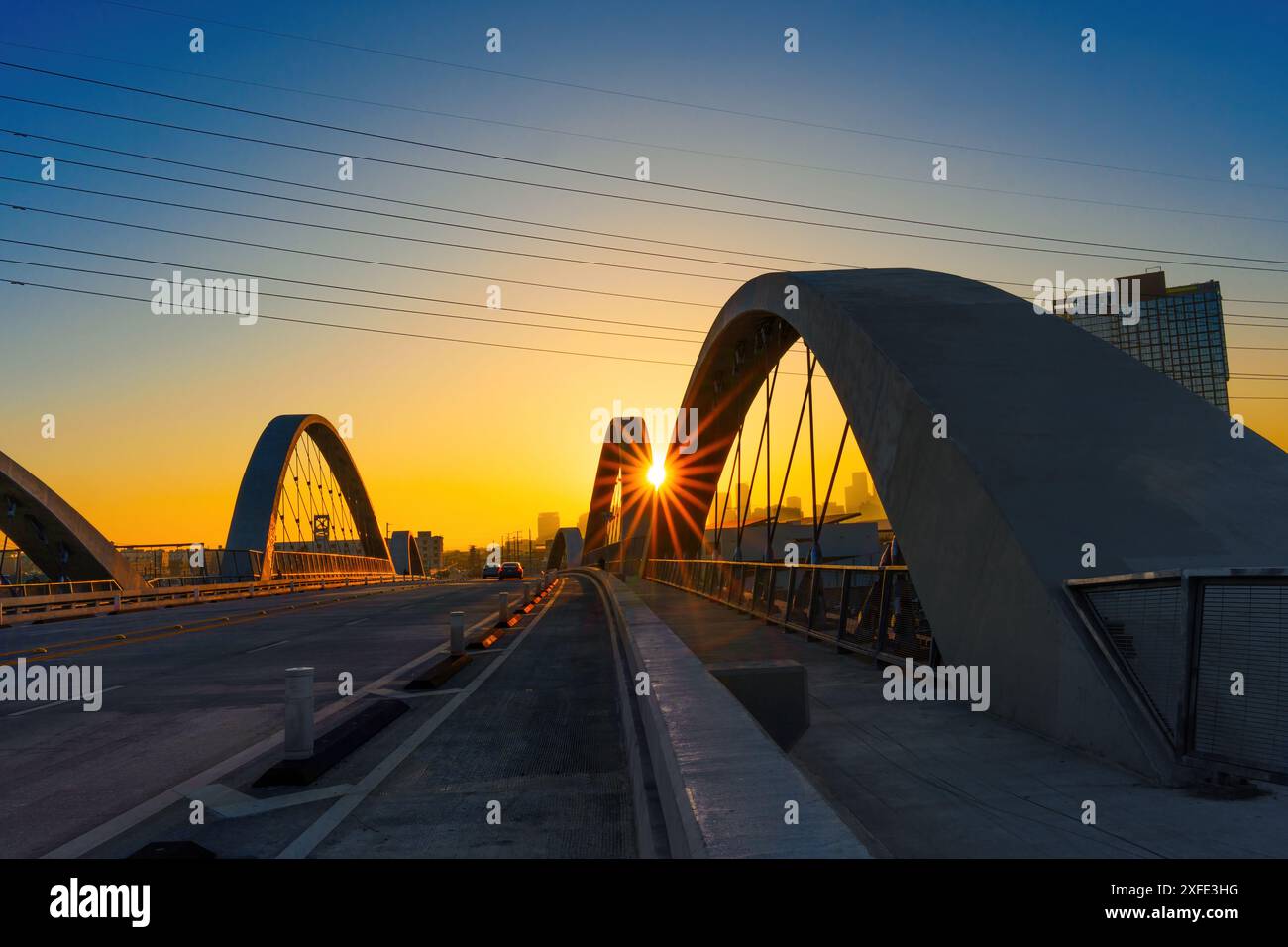 Sun sets with stunning starburst rays on the iconic 6th Street Bridge ...