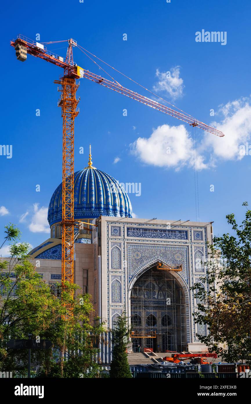 crane on a construction site is building a new large mosque the Center ...