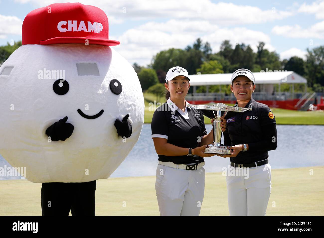 Ruoning Yin, left, and Atthaya Thitikul hold the trophy after winning ...