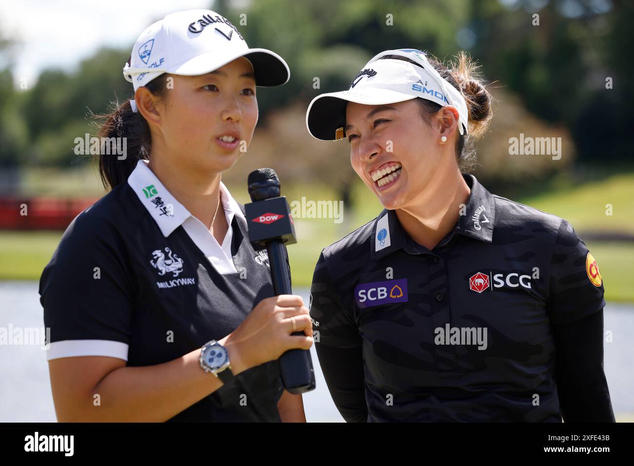 Ruoning Yin, left, and Atthaya Thitikul speak to the crowd after winning the Dow Championship ...