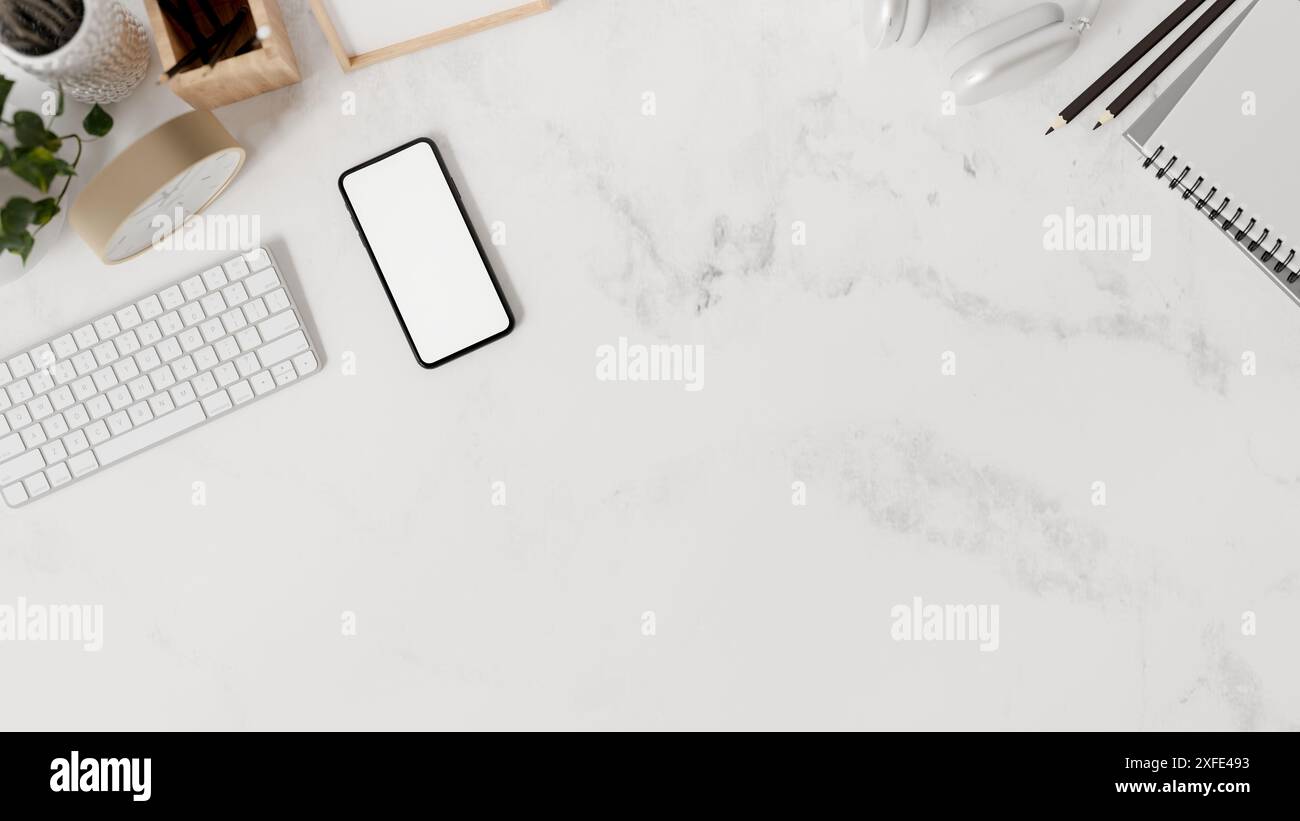 A white marble tabletop workspace features a keyboard, stationery, a ...