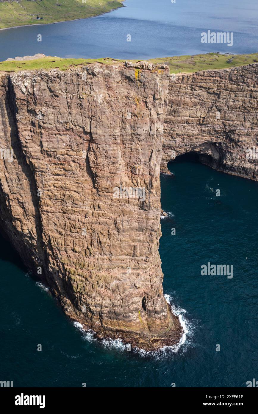 Denmark, Faroe Islands, island of Vagar, lake Leitisvatn and cliffs ...