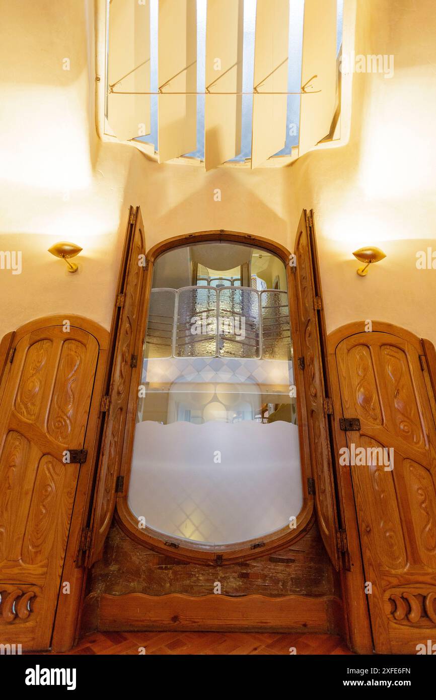 Spain, Catalonia, Barcelona, window of the patio with reflection of the ...