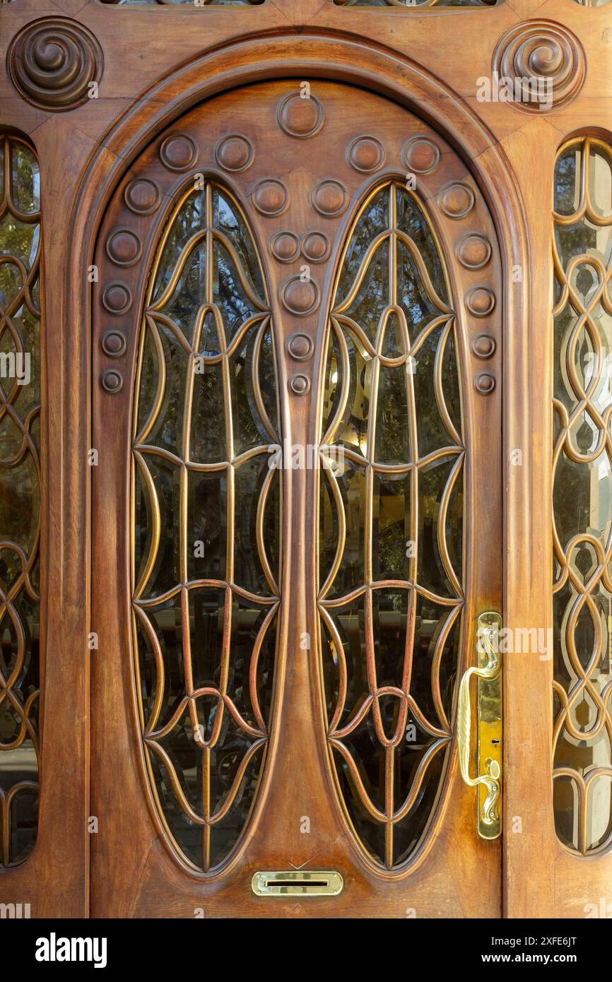 Spain, Catalonia, Barcelona, detail of the door of the Casa Comalat, an ...