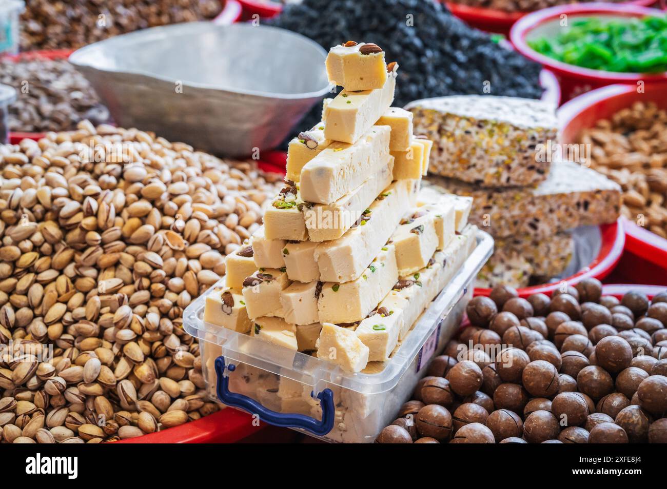 Uzbek halva, oriental sweets, dried fruits and various varieties of ...