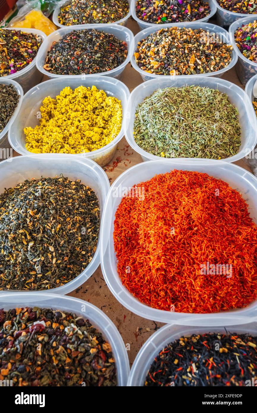 assortment of oriental herbal and flower teas on the counter at the ...