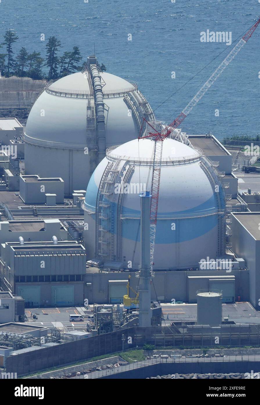 An aerial photo shows Unit 3 and 4 of Genkai Nuclear Power Station in ...