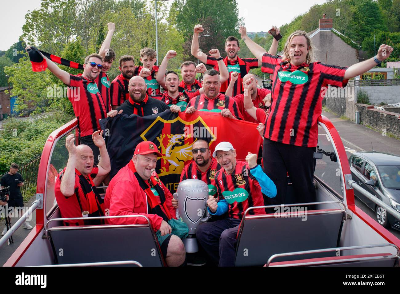 EDITORIAL USE ONLY Players from Cwm Albion football club celebrate ...