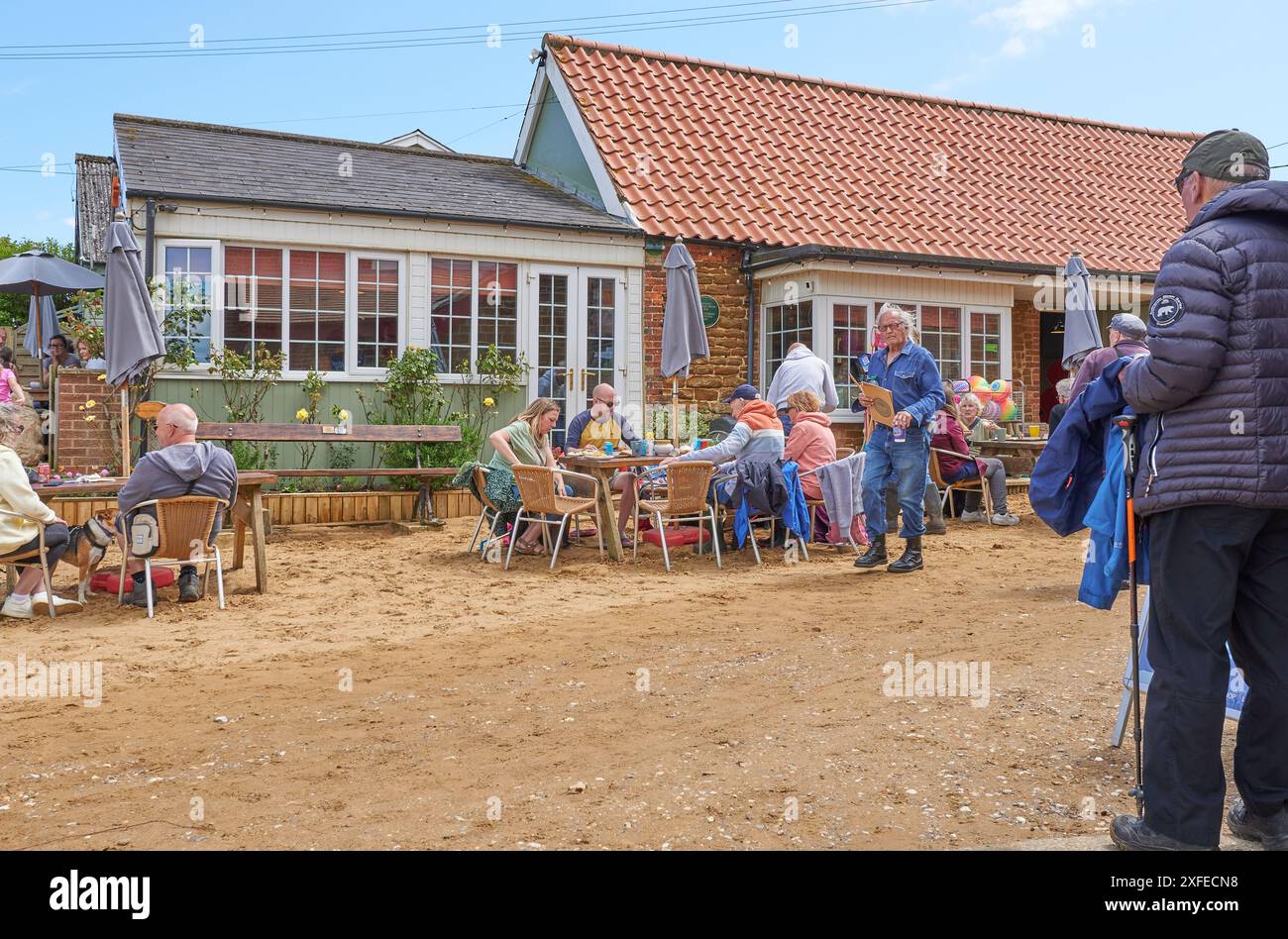 People outside a beach cafe in Old Hunstanton, Norfolk, UKfolk Stock ...