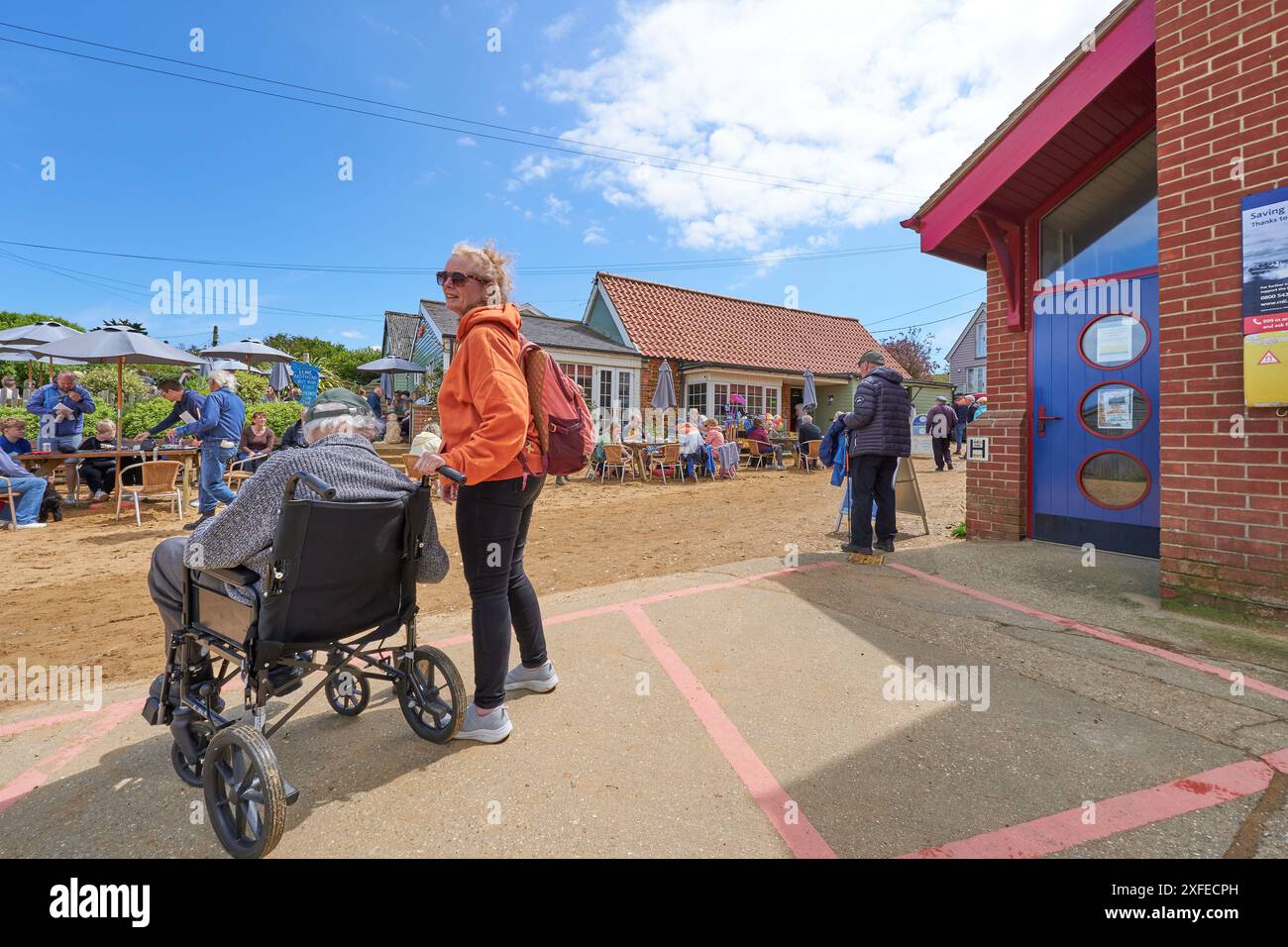 People outside a beach cafe in Old Hunstanton, Norfolk, UKfolk Stock ...
