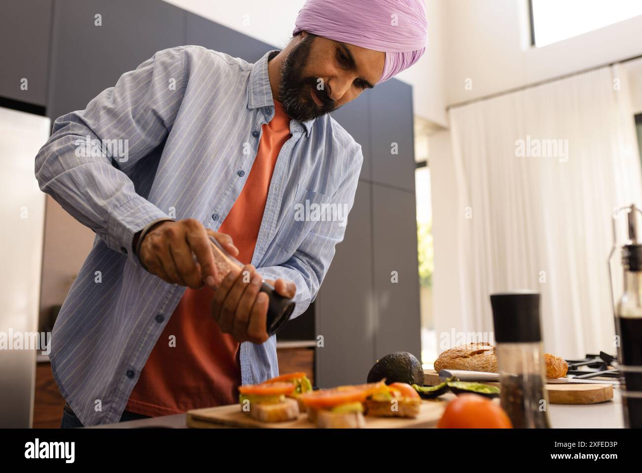 Professional chef seasoning ingredients preparing hi-res stock ...