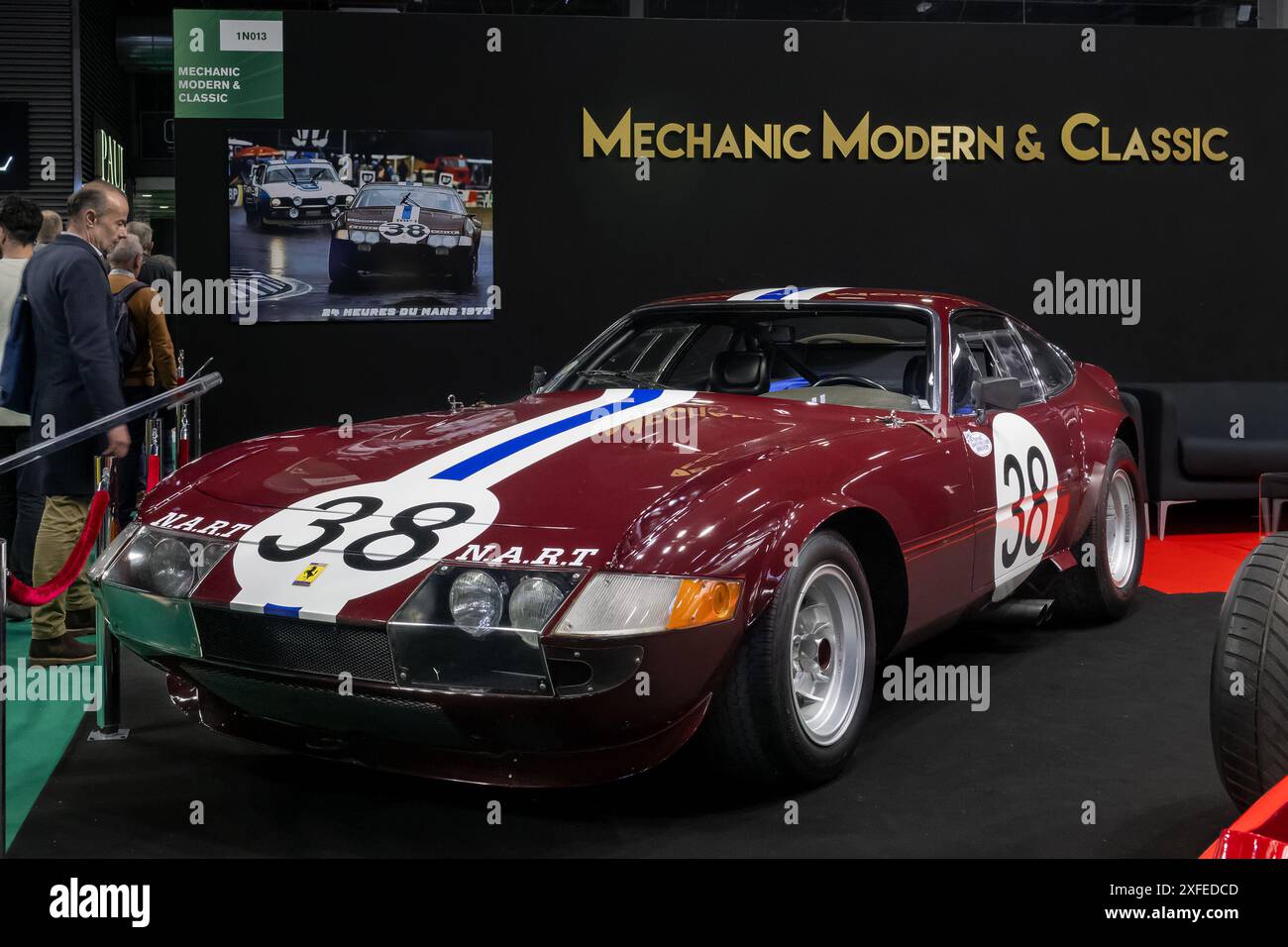 Paris, France - Rétromobile 2024. View on a burgundy 1970 Ferrari 365 ...