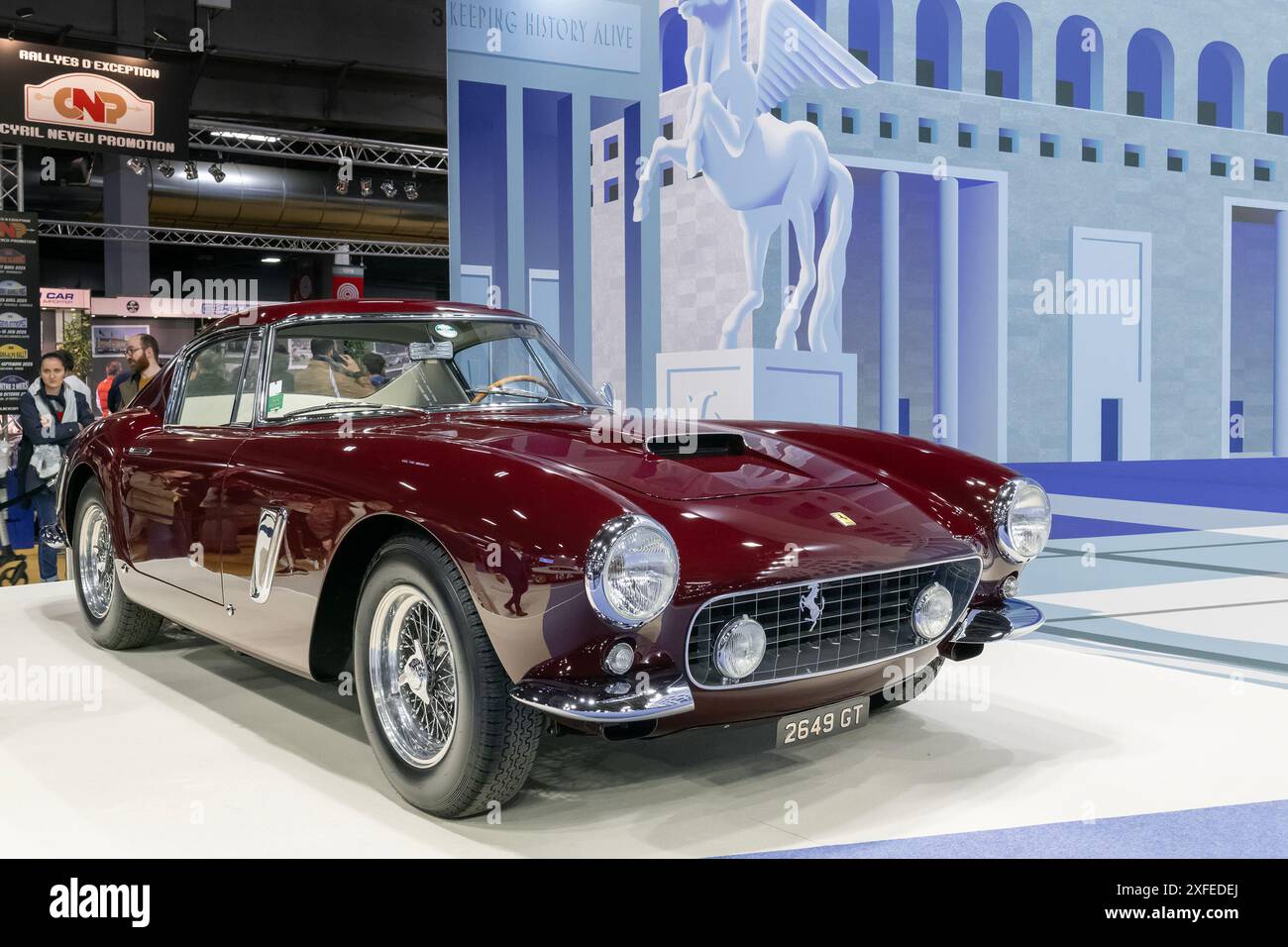 Paris, France - Rétromobile 2023. View on a Rosso Bordeaux 1961 Ferrari ...