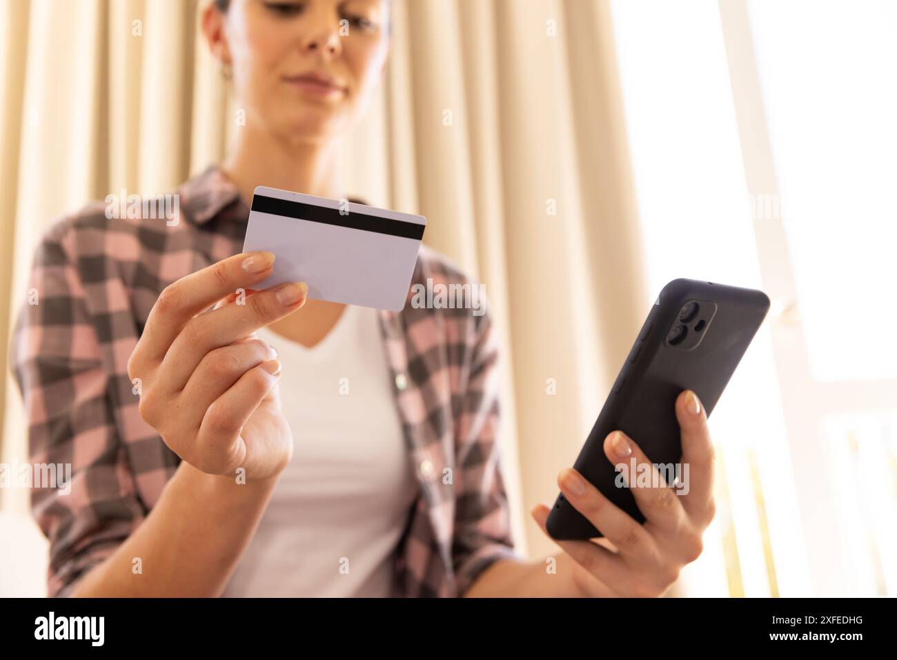 Making online payment their credit card hi-res stock photography and ...