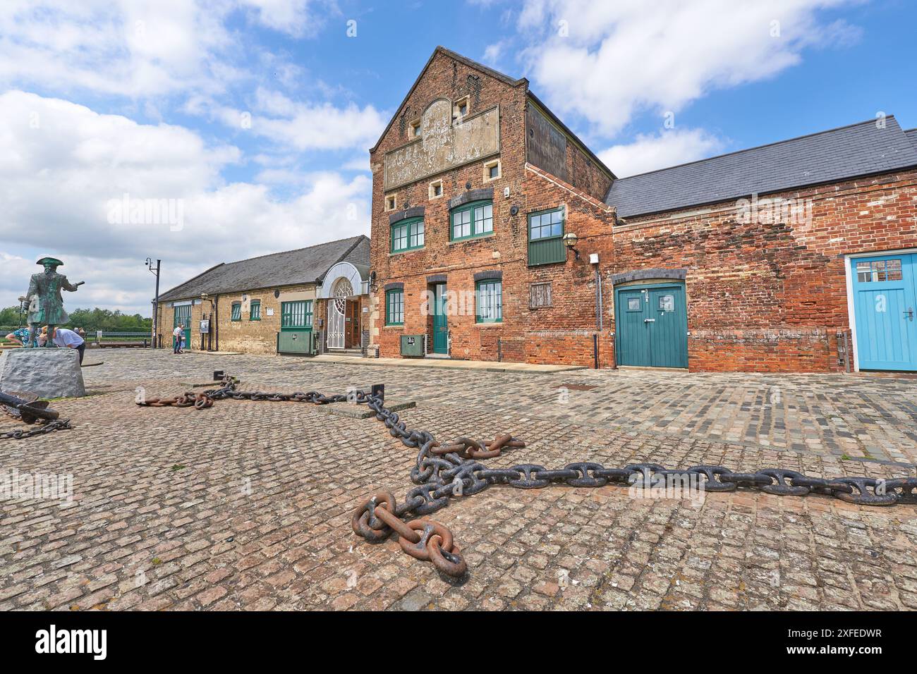 Old ships anchor chain on a quayside Stock Photo - Alamy