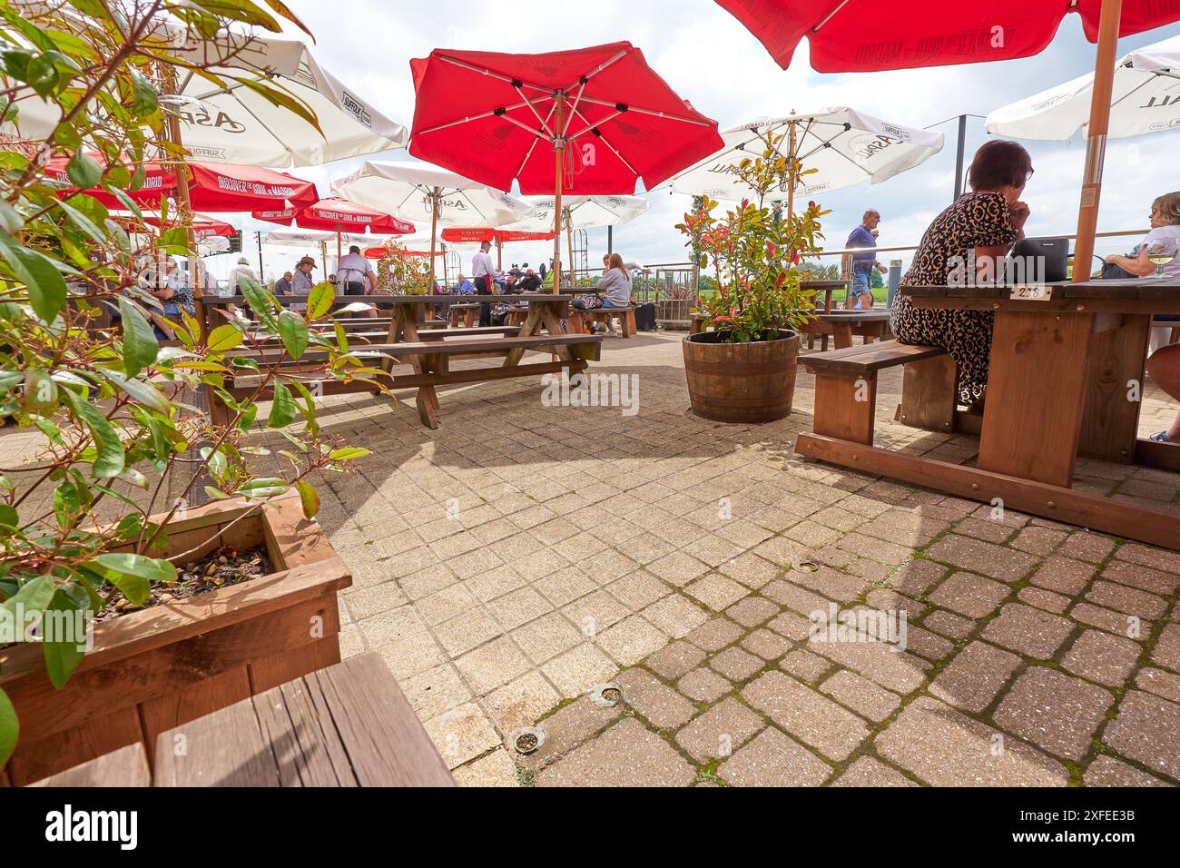 Customers eating outside at a pub Stock Photo - Alamy