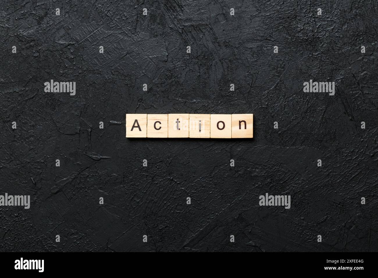 Action word written on wood block. Action text on table, concept Stock ...