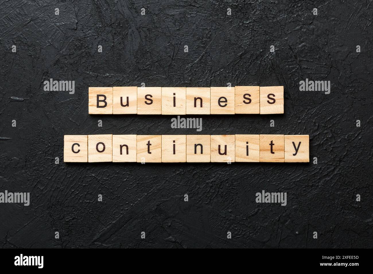 Business Continuity word written on wood block. Business Continuity ...