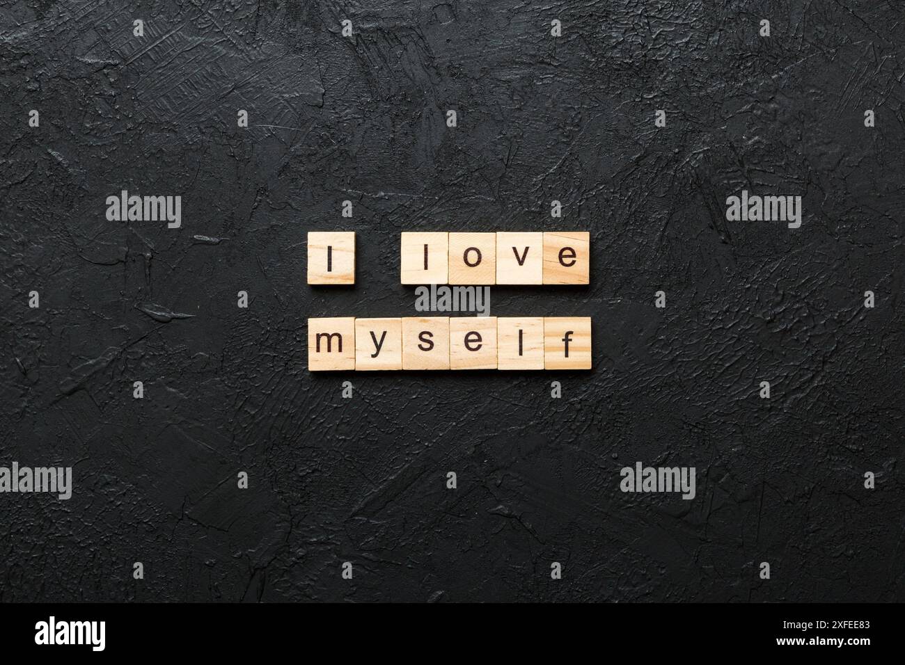 I Love myself word written on wood block. I Love myself text on cement ...