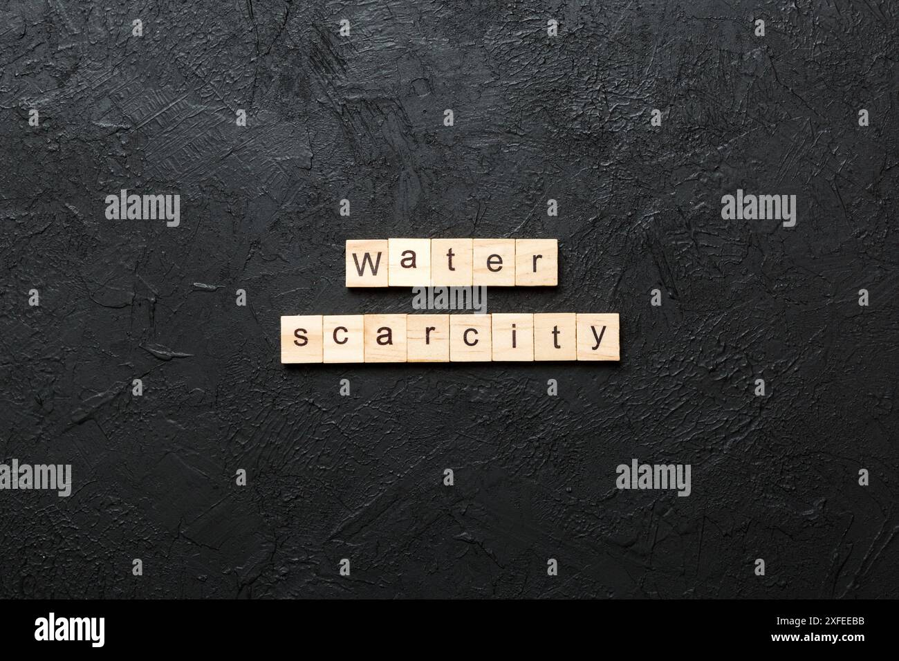 Water scarcity word written on wood block. Water scarcity text on ...