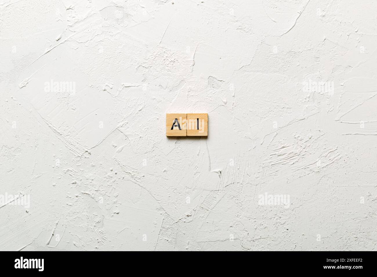 Artificial Intelligence word written on wood block. AI text on cement ...