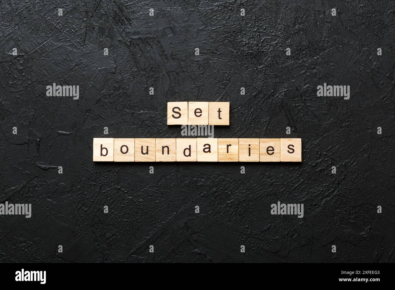 set boundaries word written on wood block. set boundaries text on table ...