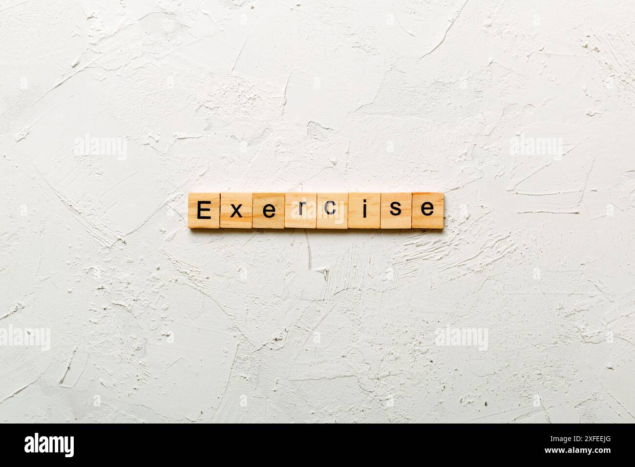 exercise word written on wood block. exercise text on table, concept ...