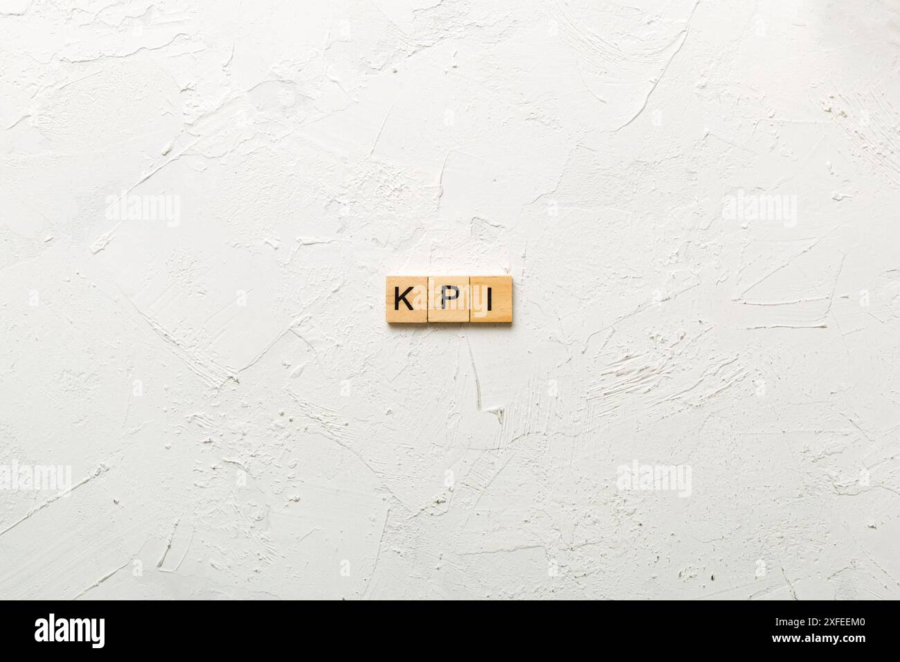 kpi word written on wood block. key performance indicators text on ...