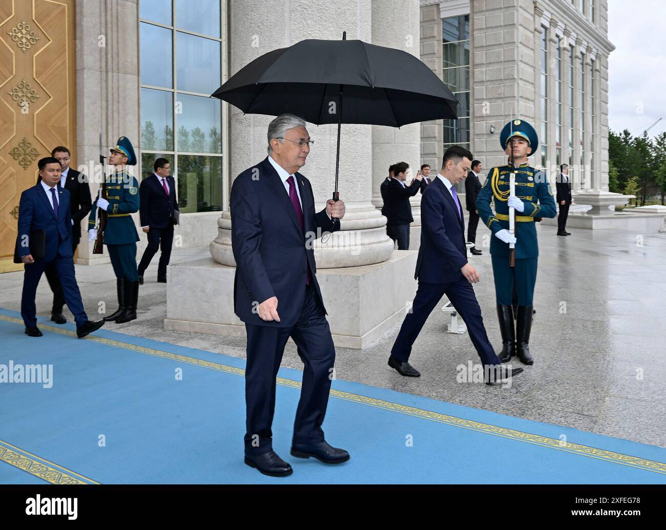 (240703) -- ASTANA, July 3, 2024 (Xinhua) -- Kazakh President Kassym-Jomart Tokayev walks to ...