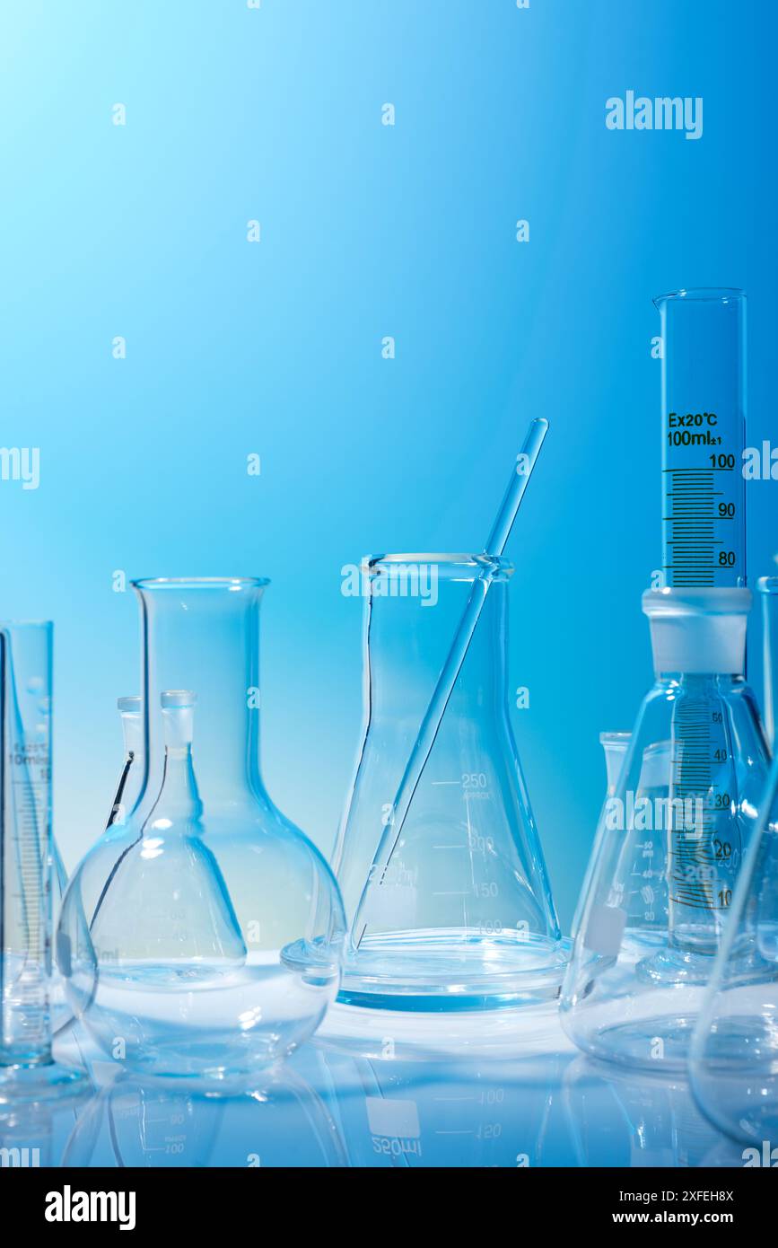 Close up of a glass bottles standing on a laboratory countertop and ...