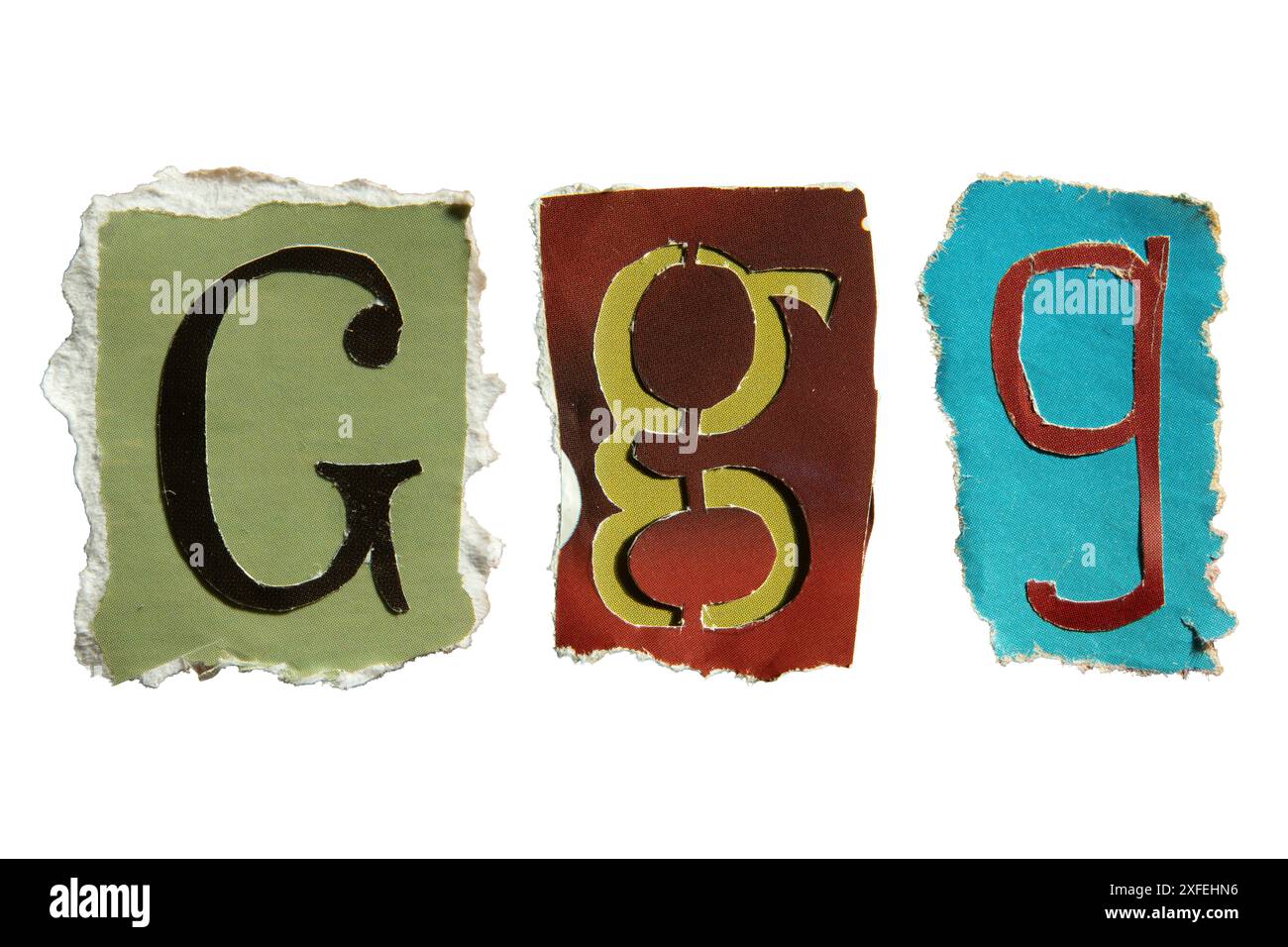 G alphabet torn from a magazine paper on white background with clipping ...