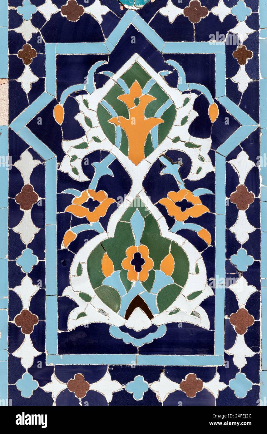 Arabic mosaic pattern as a part of an ancient wall decoration, close-up ...