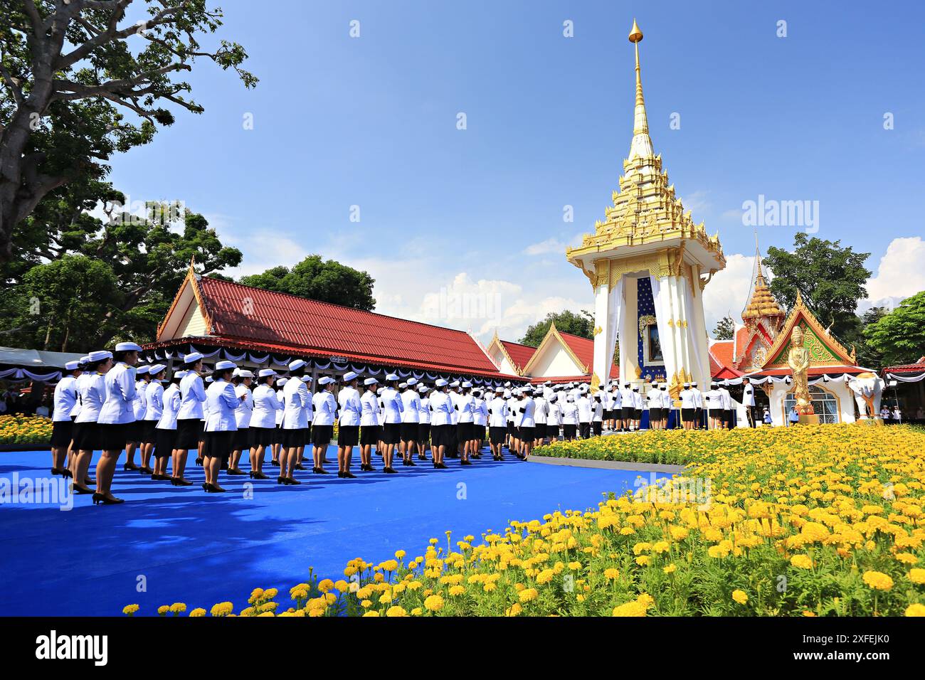 Government officials and citizens join the royal flower laying ceremony ...