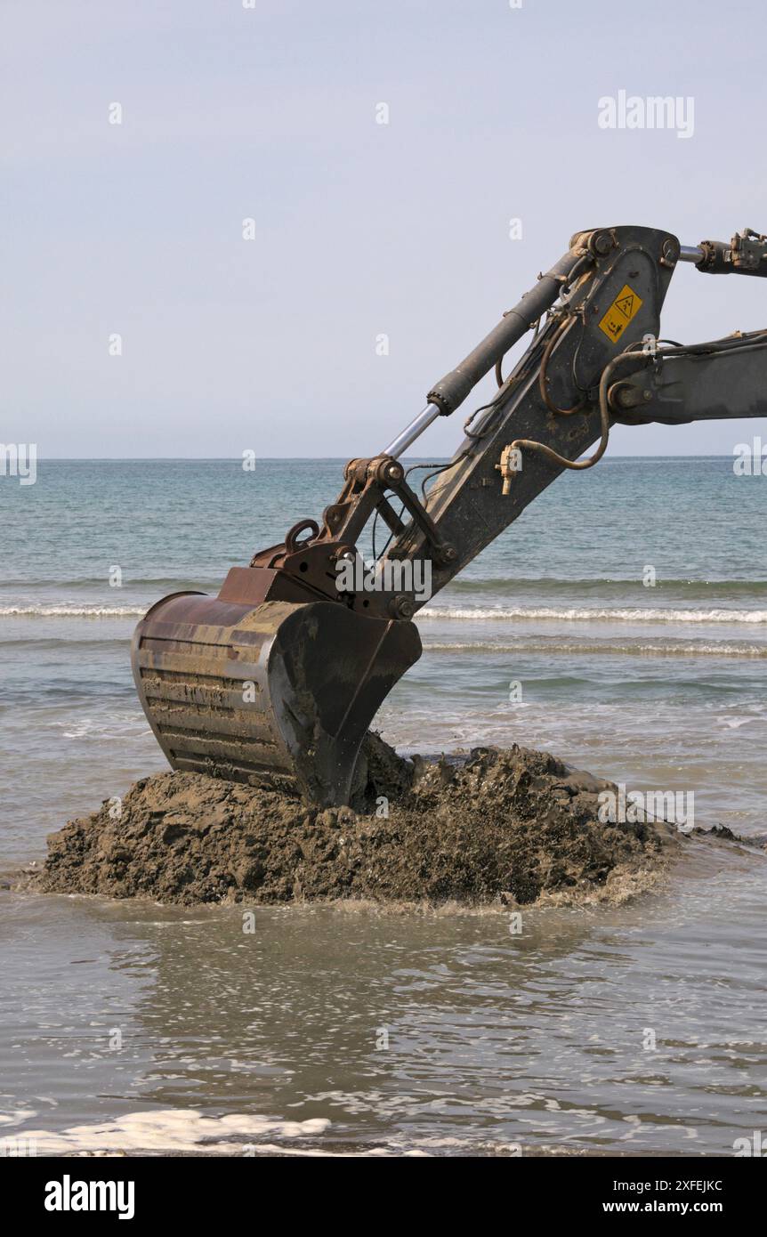 hydraulic excavator used for sand replenishment / beach nourishment ...