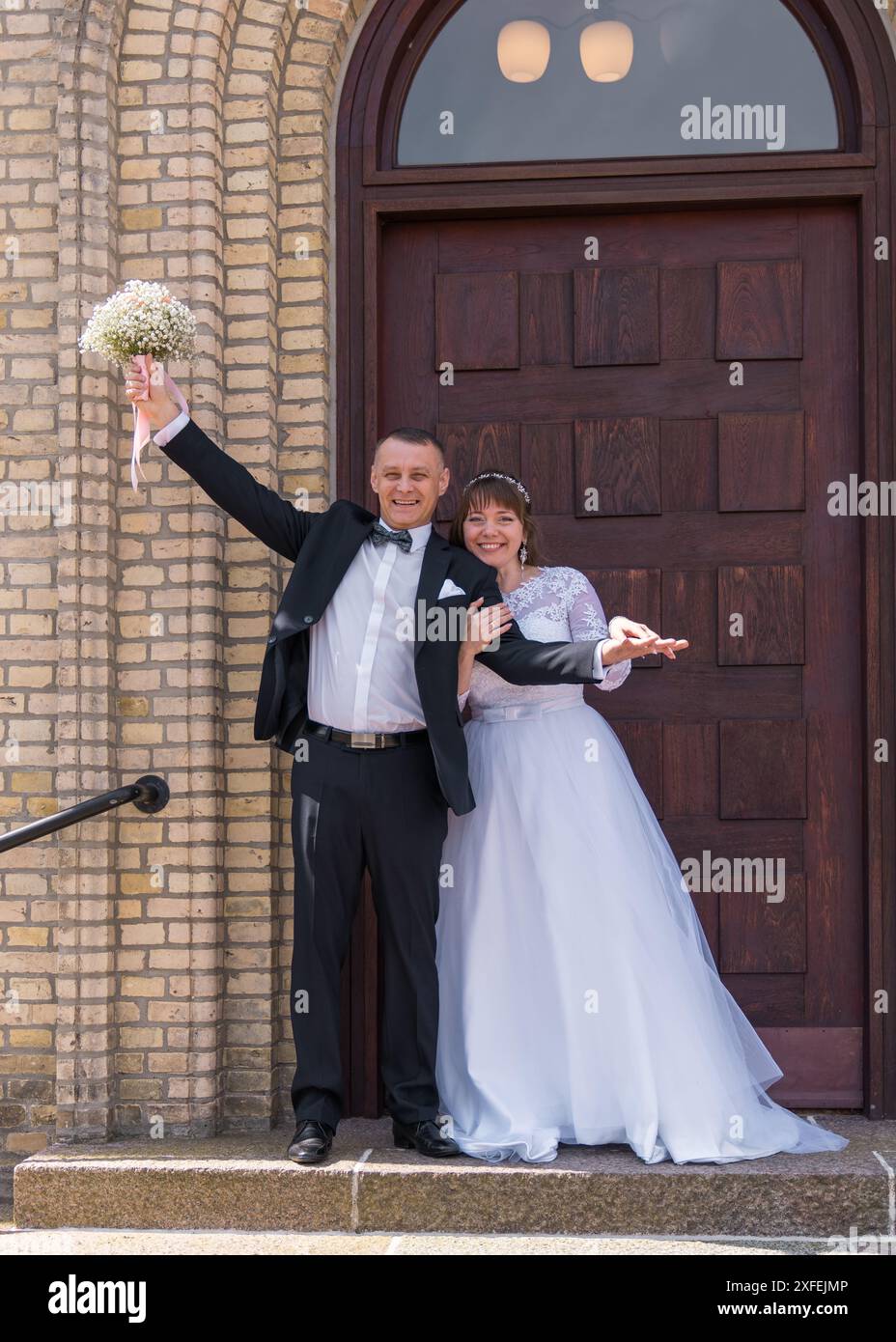 The bride and groom just got married, delight, joy, emotions. The ...