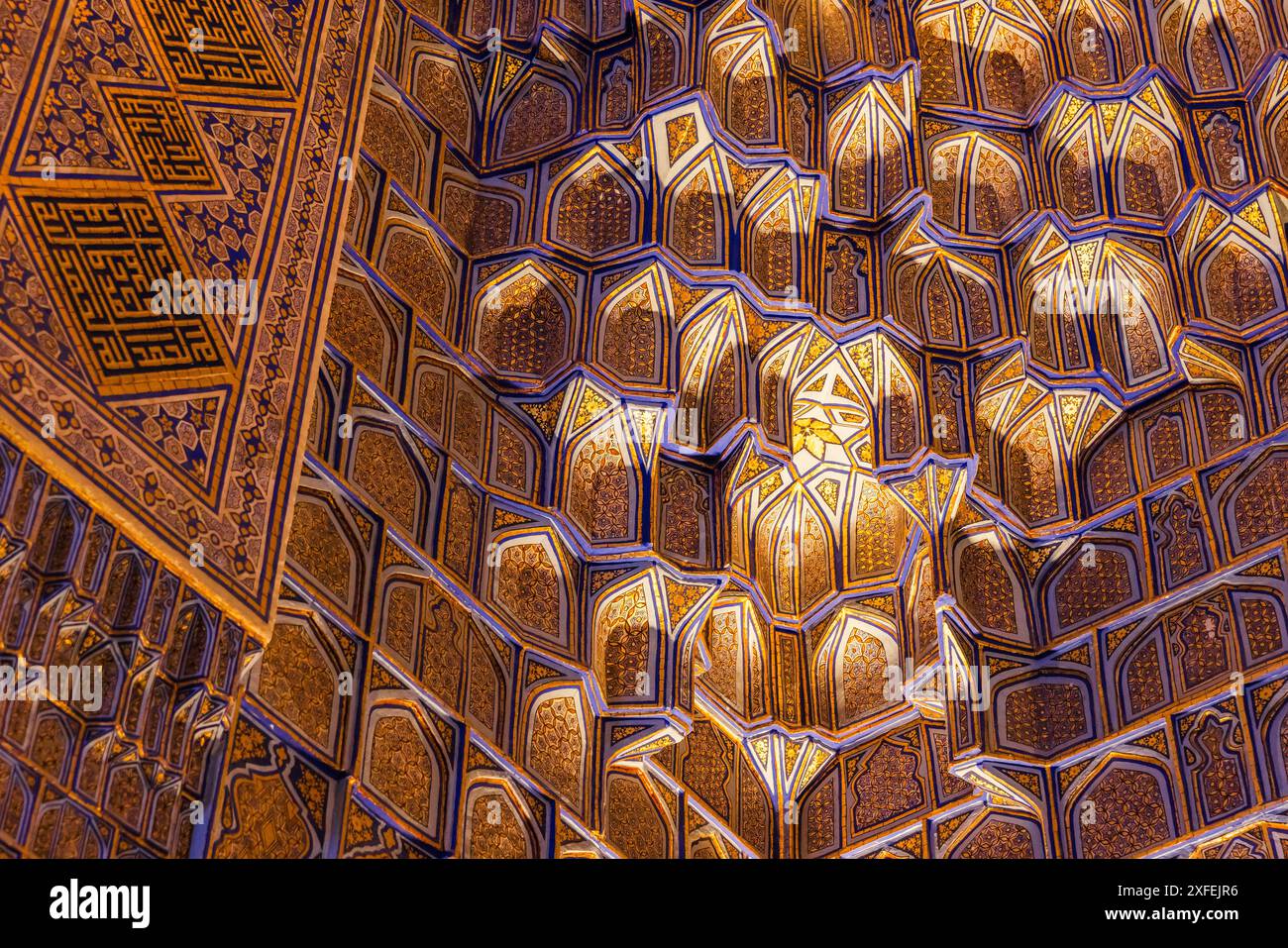 Niche with diverse muqarnas decoration. Gur-e-Amir mausoleum erected on ...